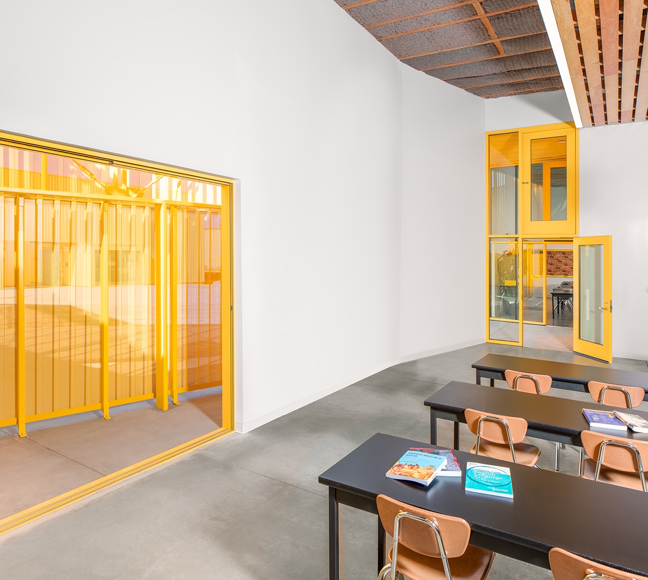 Los Angeles. Brooks+Scarpa designed a bright-yellow high school in a ...
