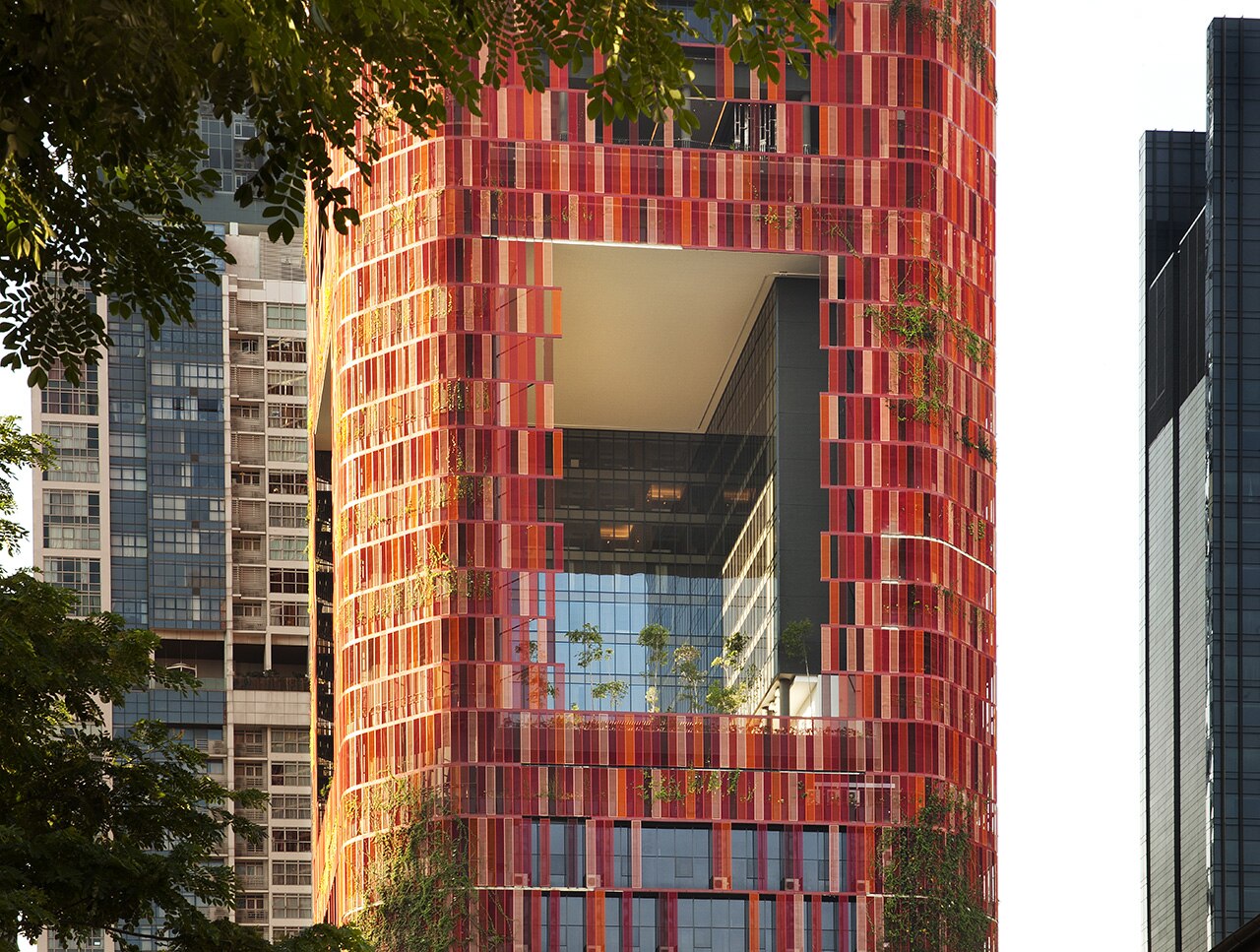 Singapore. WOHA architects designed a red tower filled with green creepers
