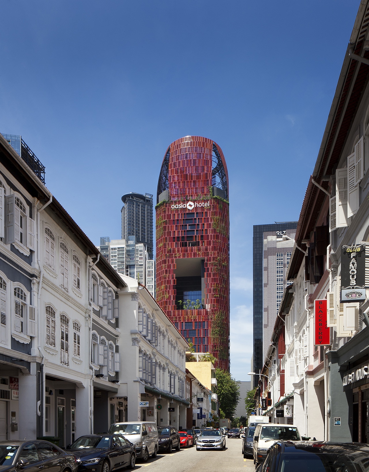 Singapore. WOHA architects designed a red tower filled with green creepers