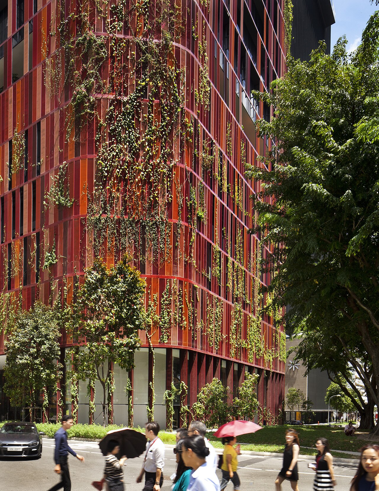Singapore. WOHA architects designed a red tower filled with green creepers