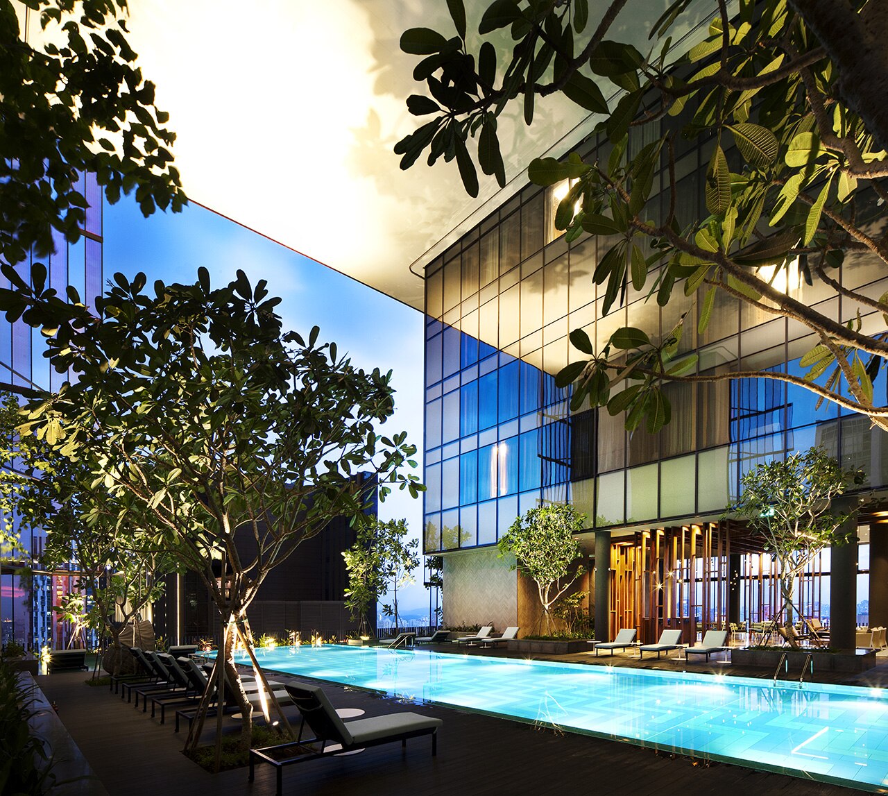 Singapore. WOHA architects designed a red tower filled with green creepers