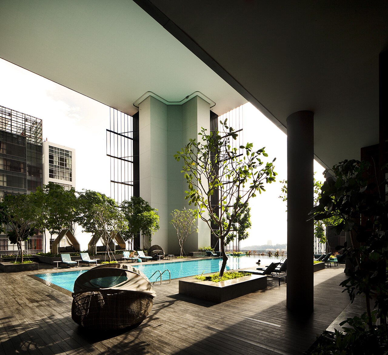 Singapore. WOHA architects designed a red tower filled with green creepers