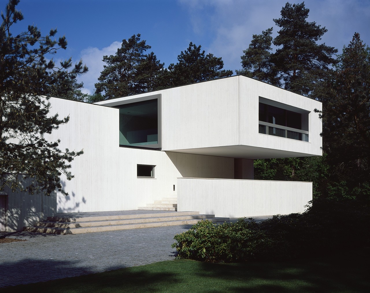 Netherlands. Russel Jones completes a sheer white concrete villa in a ...