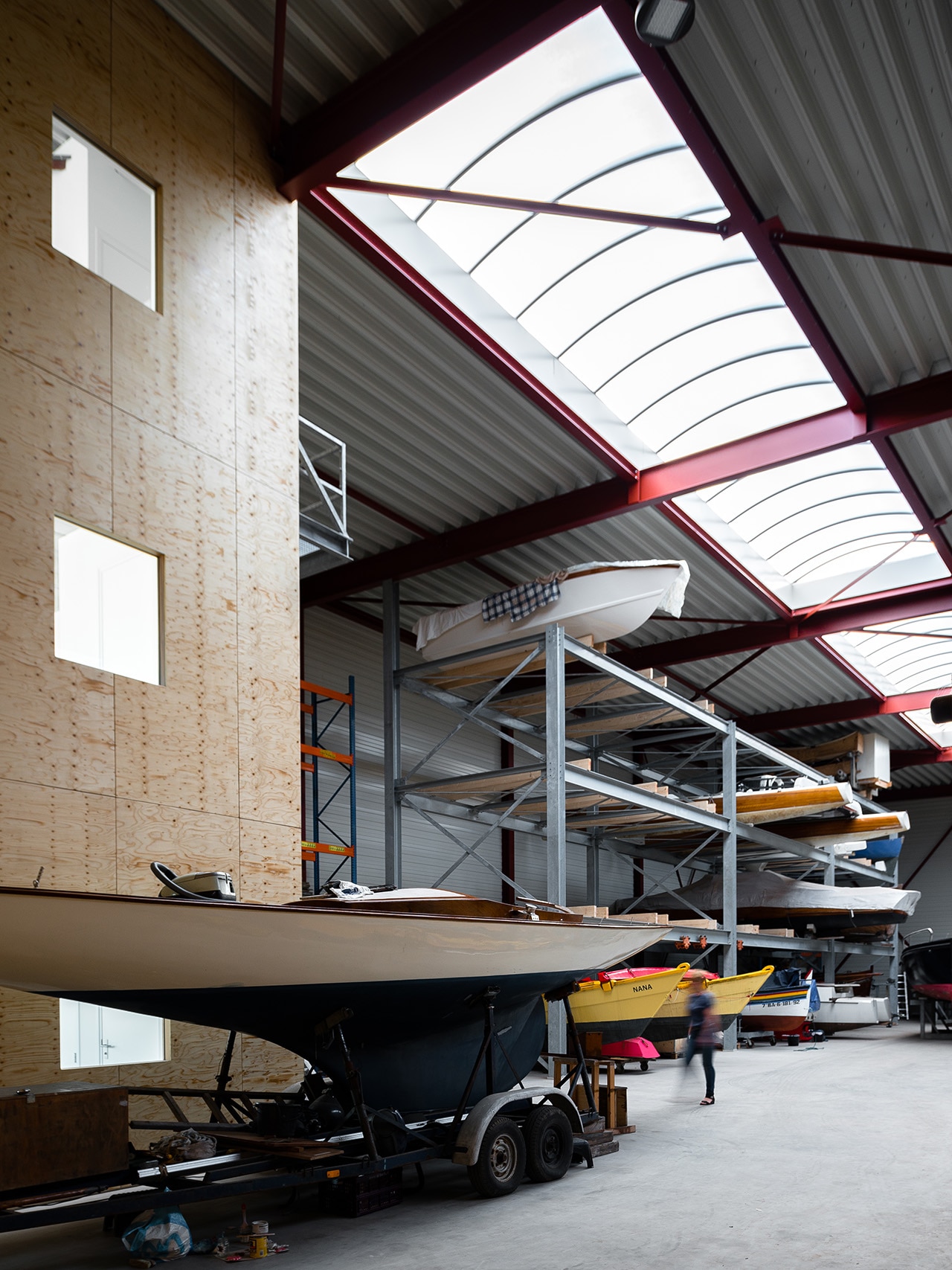 Amsterdam. A boat hangar interacting with the new life of a shipyard ...