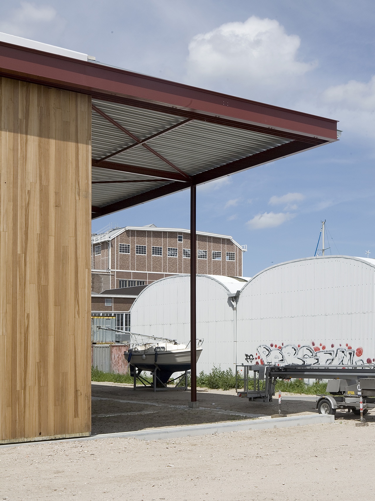 Amsterdam. A boat hangar interacting with the new life of a shipyard ...