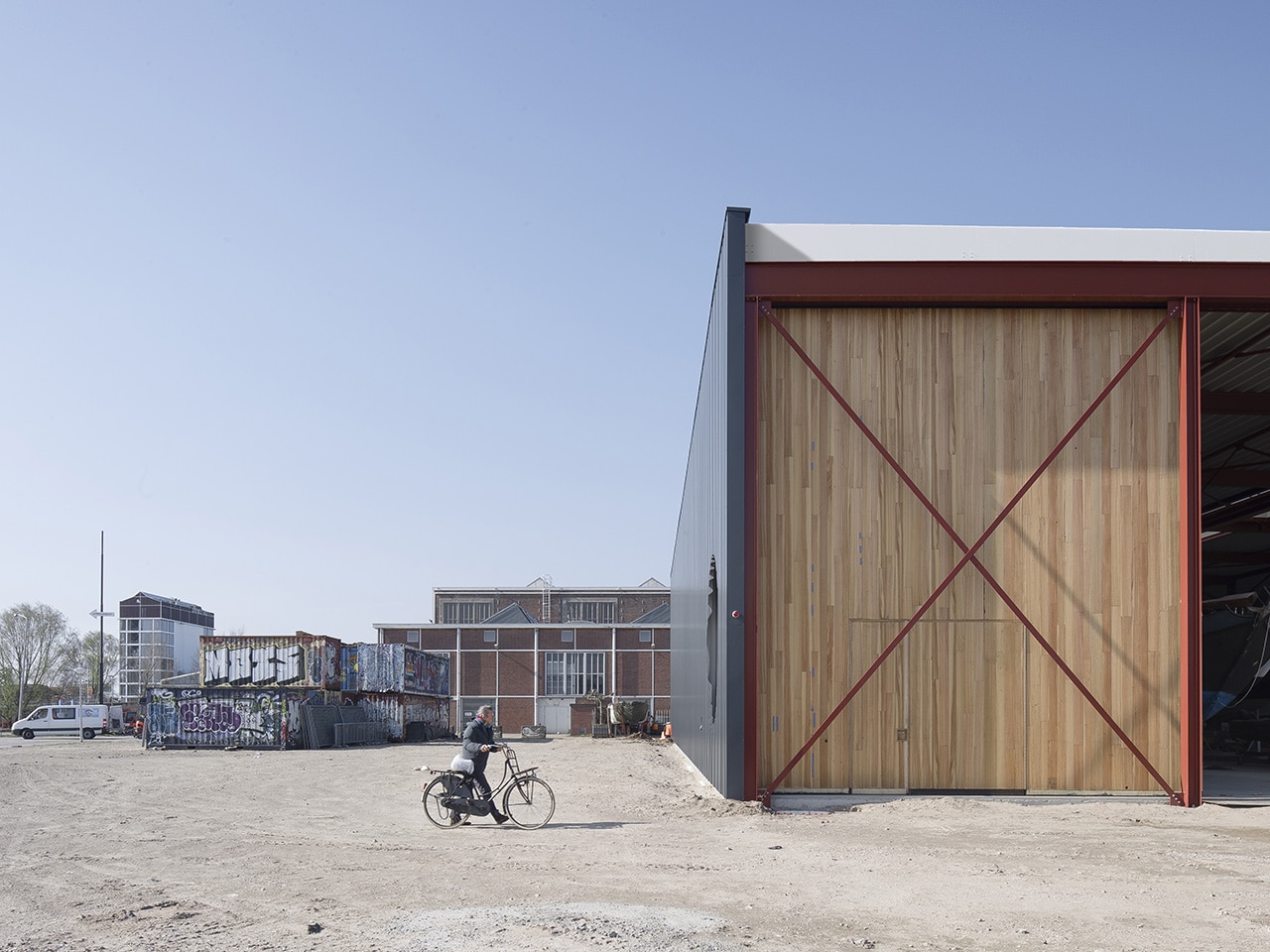 Amsterdam. A boat hangar interacting with the new life of a shipyard ...
