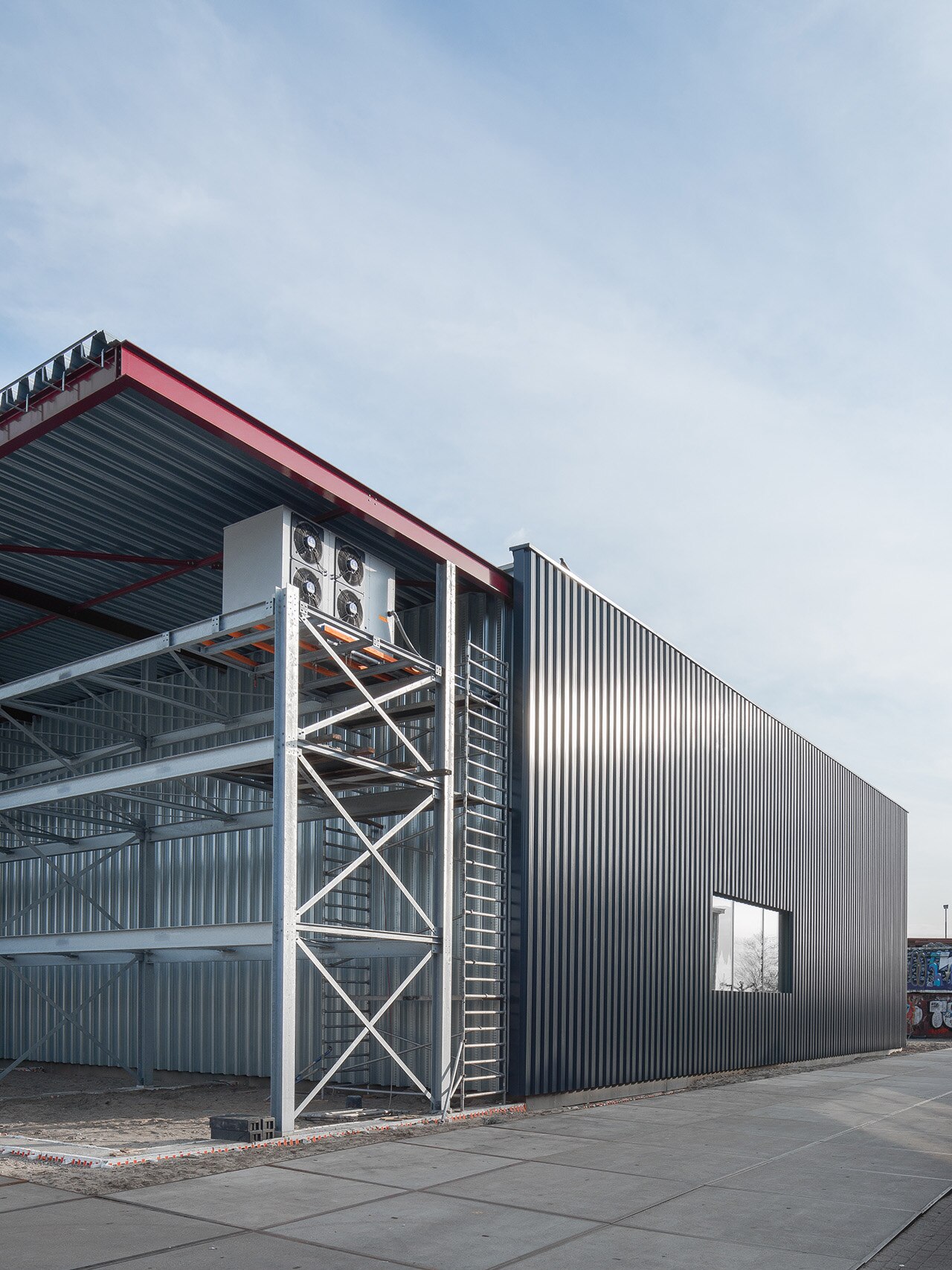 Amsterdam. A boat hangar interacting with the new life of a shipyard ...