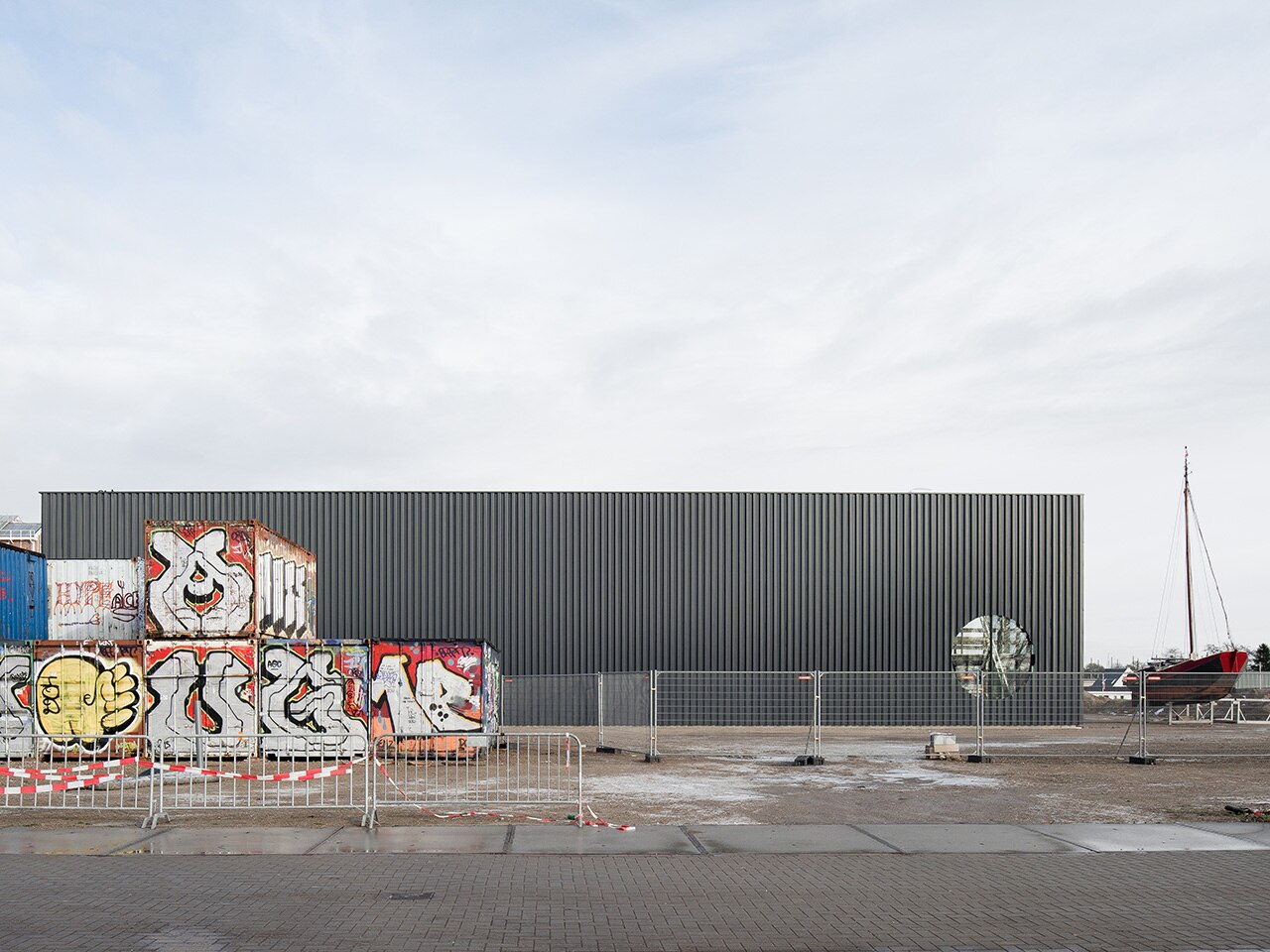 Amsterdam. A boat hangar interacting with the new life of a shipyard ...