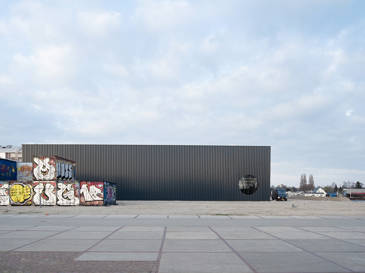 Amsterdam. A boat hangar interacting with the new life of a shipyard ...