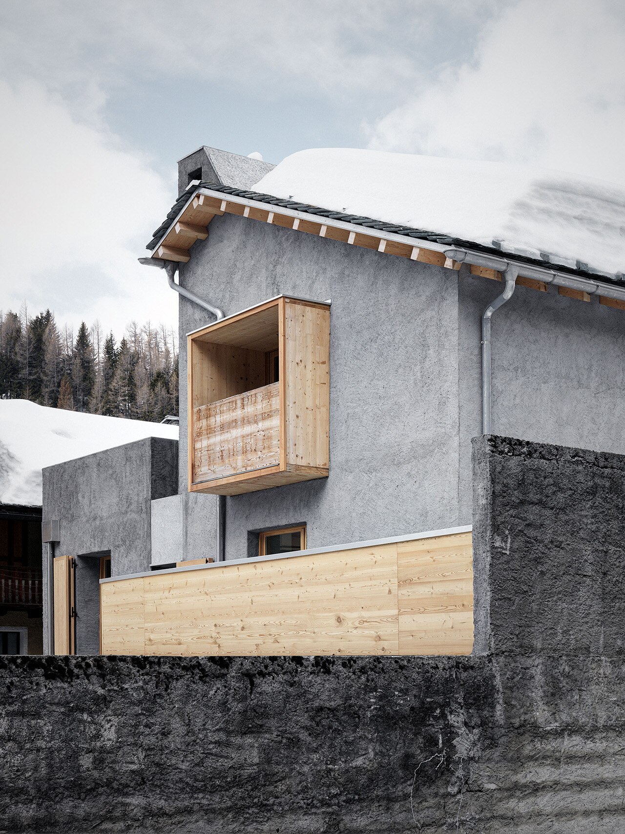 ESarch usa legno di abete e intonaco rustico grigio per rinnovare una ...