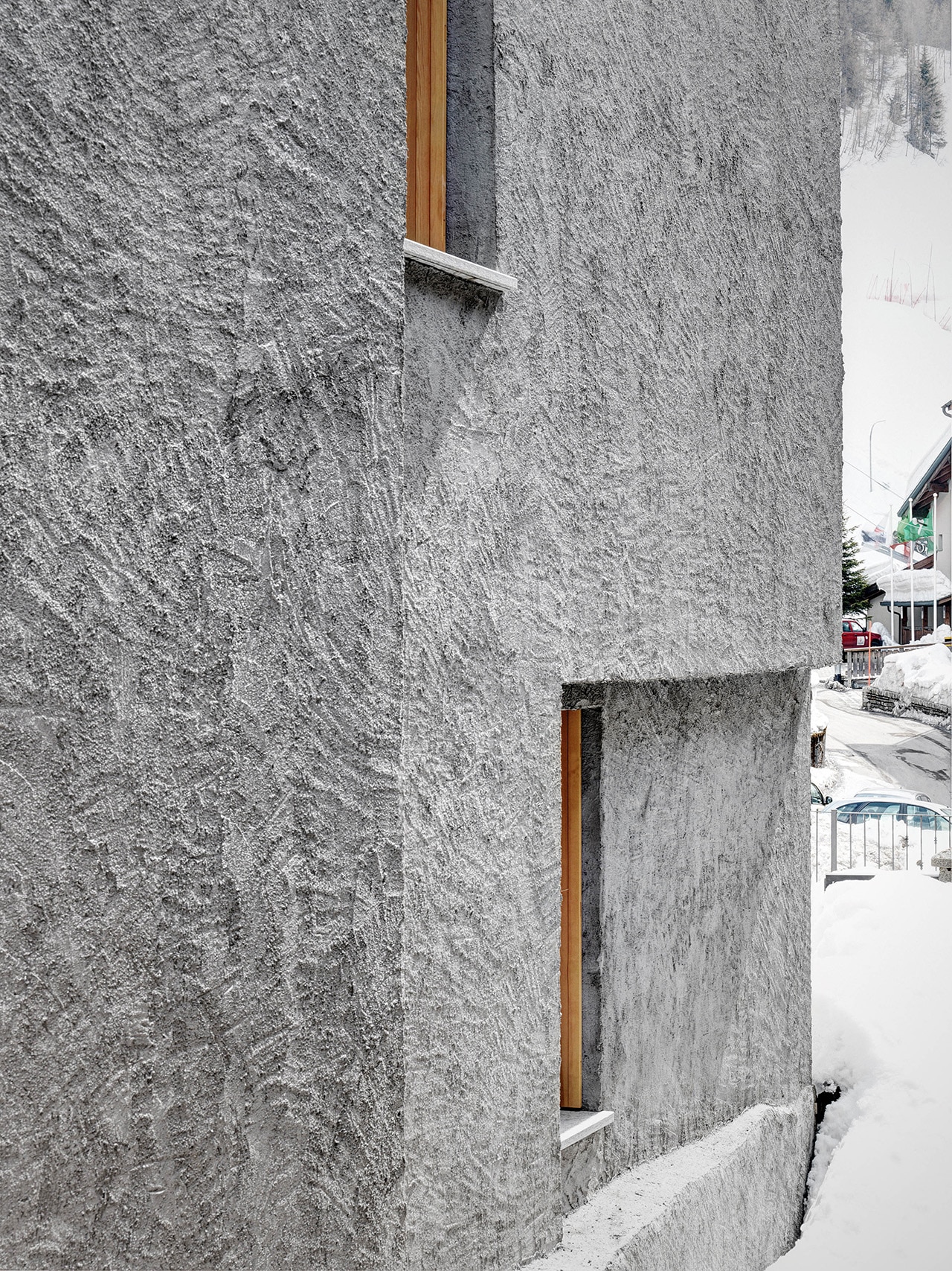Fir wood and grey rustic plaster to renovate an alpine house - Domus