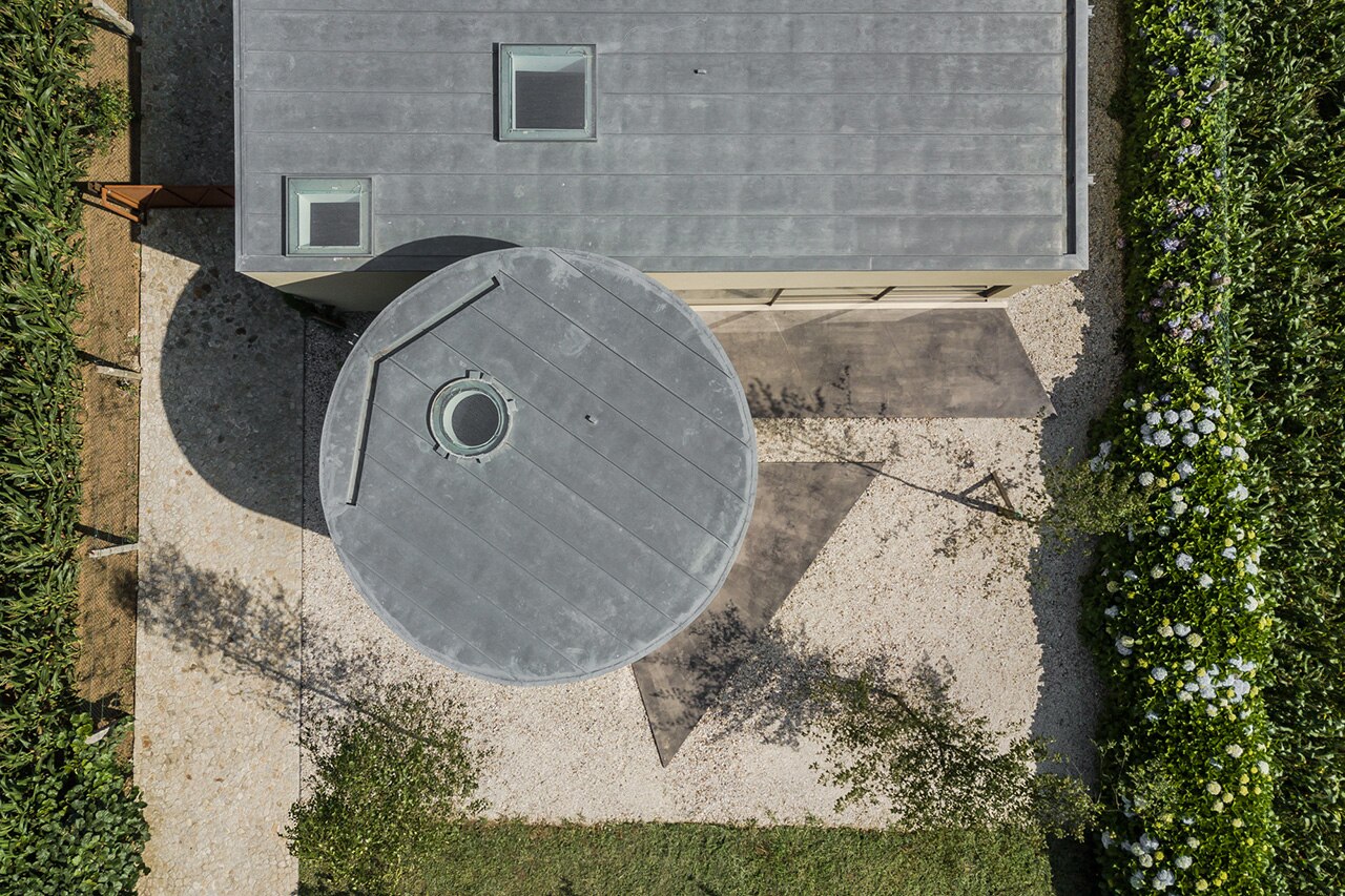 A cube, cuboid and cylinder intersect to create architecture studio in Portugal - Domus