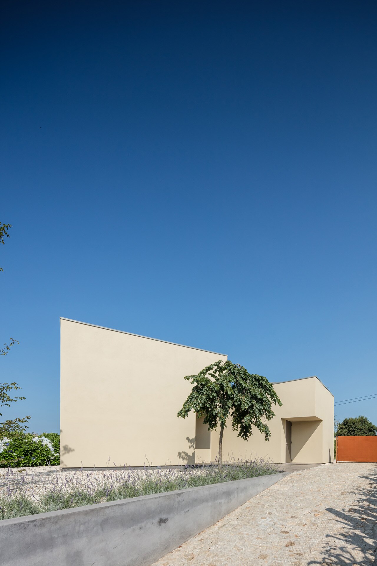 A cube, cuboid and cylinder intersect to create architecture studio in ...