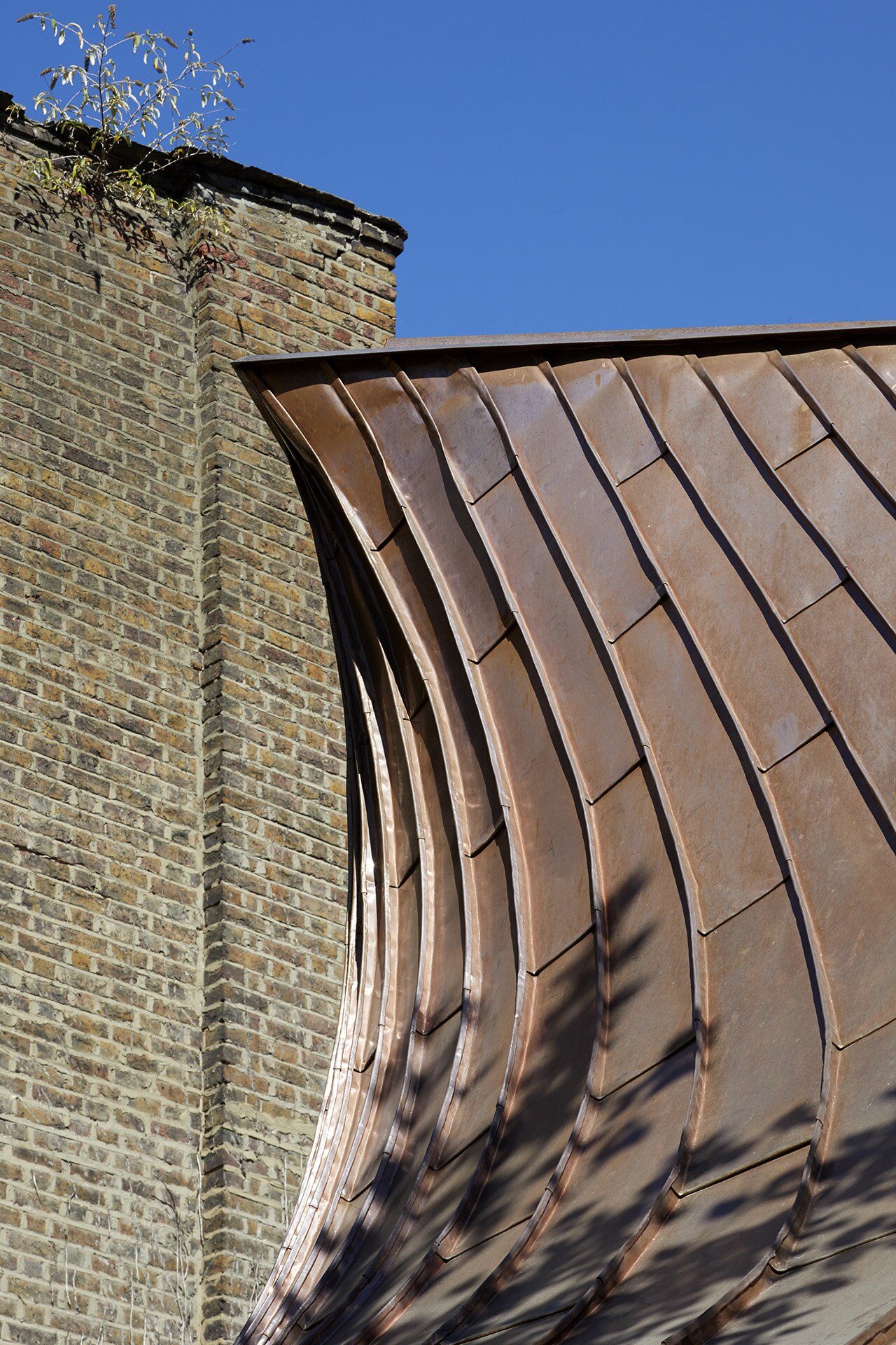 Copper roof funnels sky light into London home by Gianni Botsford ...