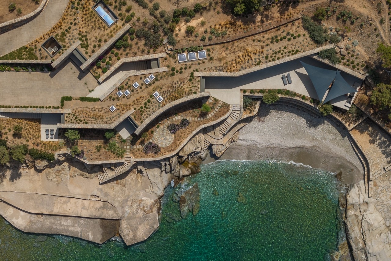 A villa on the shores of Greece carved into a hillside - Domus