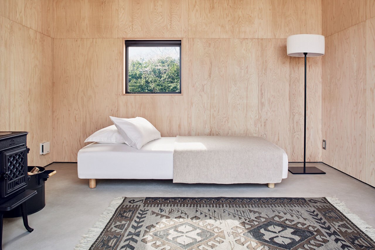 A compact wooden hut - Domus