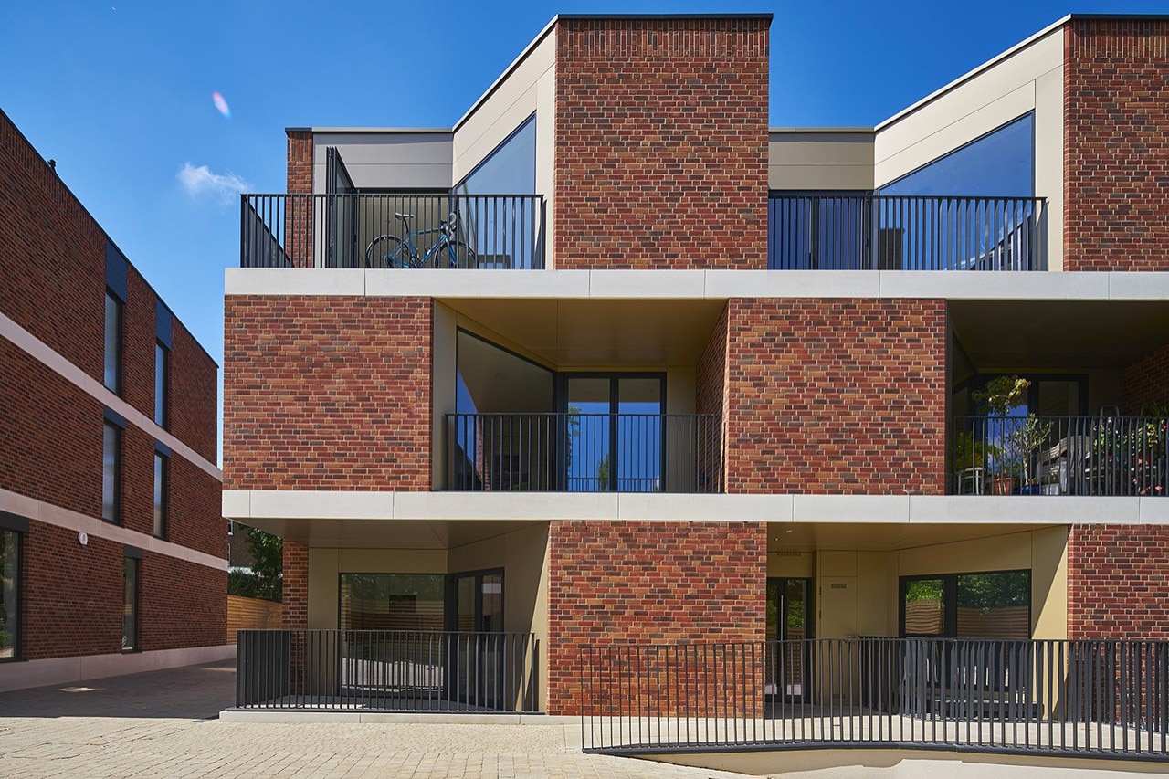 pH+ Architects designed a classic/contemporary brick housing complex in ...
