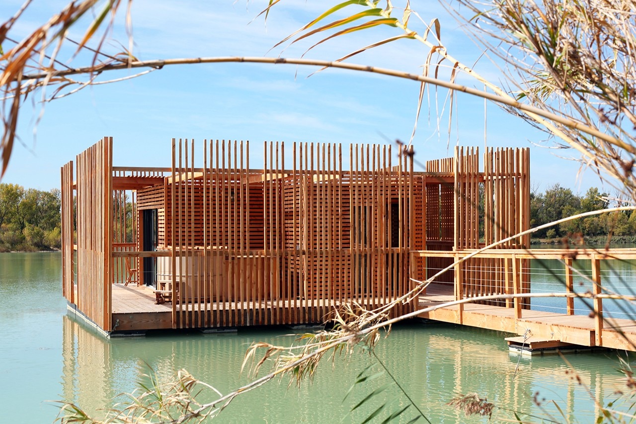 An Eco-hotel on the lake by Atelier Lavit, located in Châteauneuf-du ...