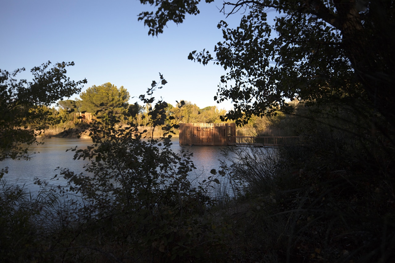 An Eco-hotel on the lake by Atelier Lavit, located in Châteauneuf-du ...