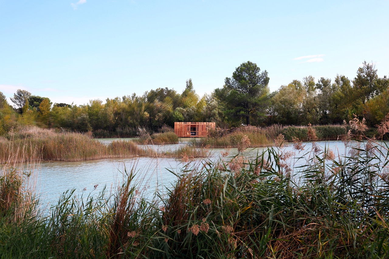 An Eco-hotel on the lake by Atelier Lavit, located in Châteauneuf-du ...