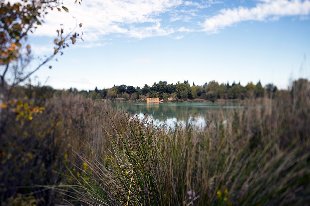 An Eco-hotel on the lake by Atelier Lavit, located in Châteauneuf-du ...