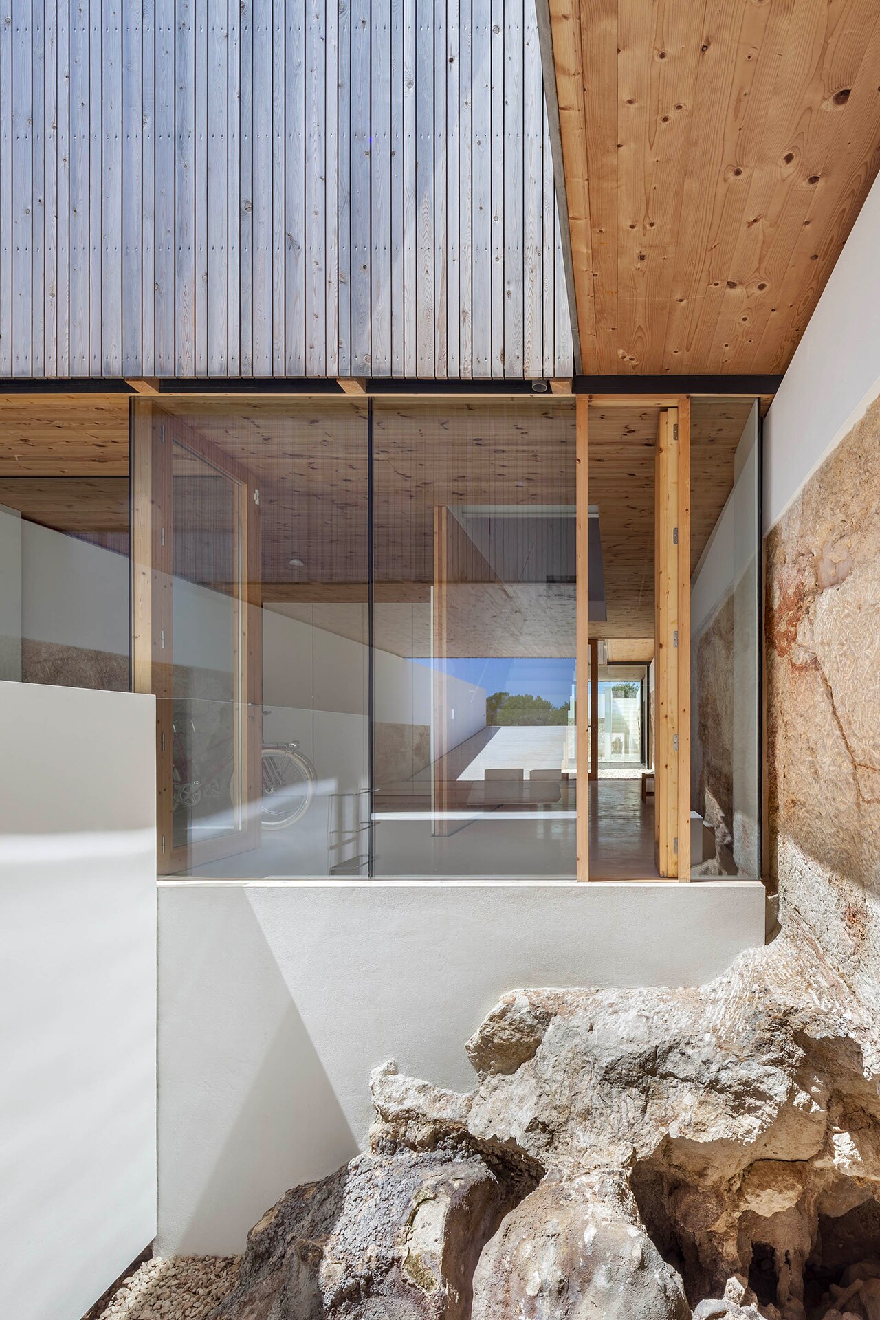 Marià Castelló Martínez has completed a house within the sculpted rock ...