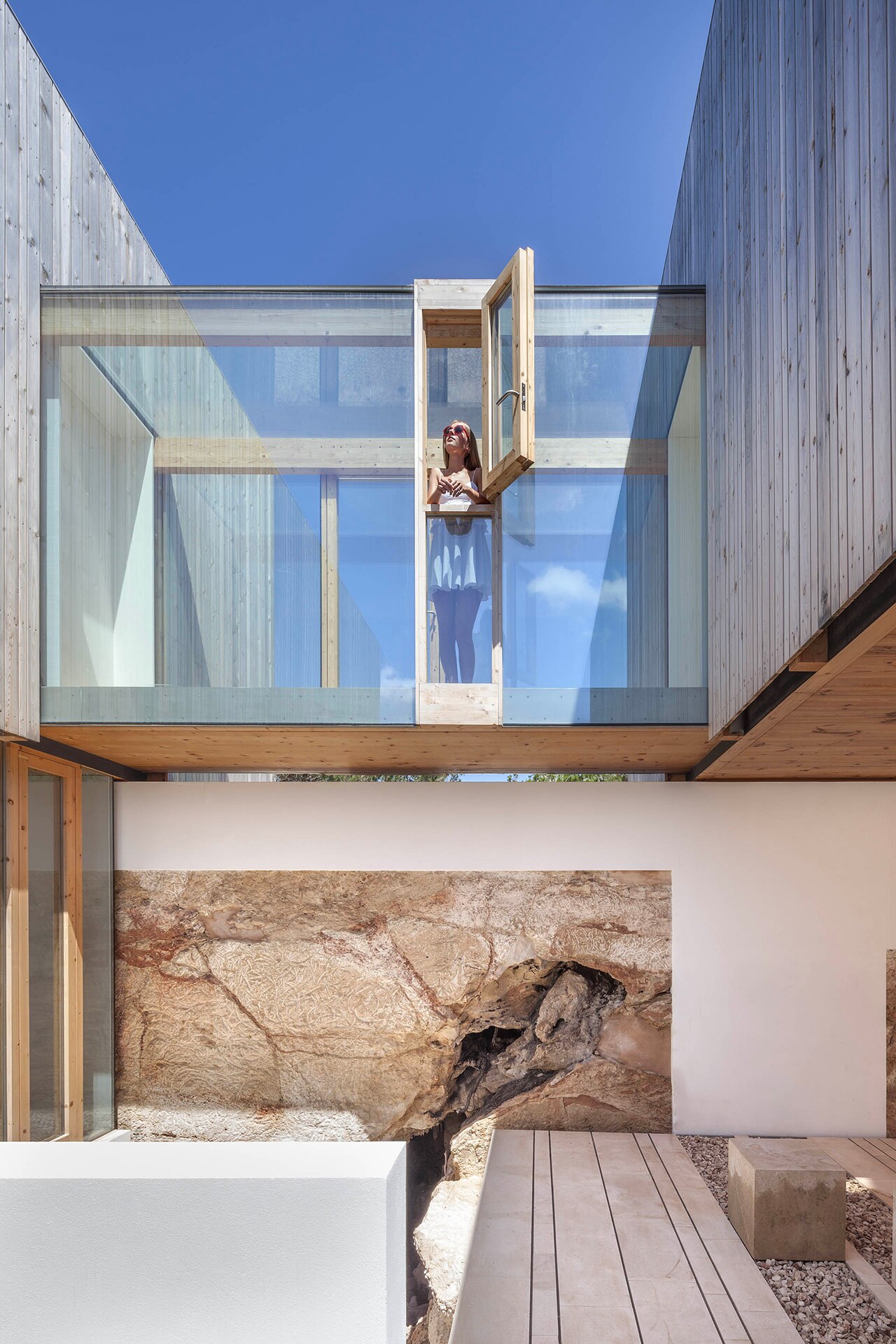Marià Castelló Martínez has completed a house within the sculpted rock ...