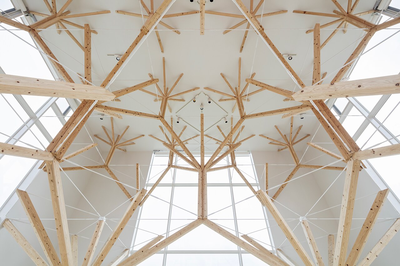 Nagasaki. A religious building with a wooden forest inside - Domus