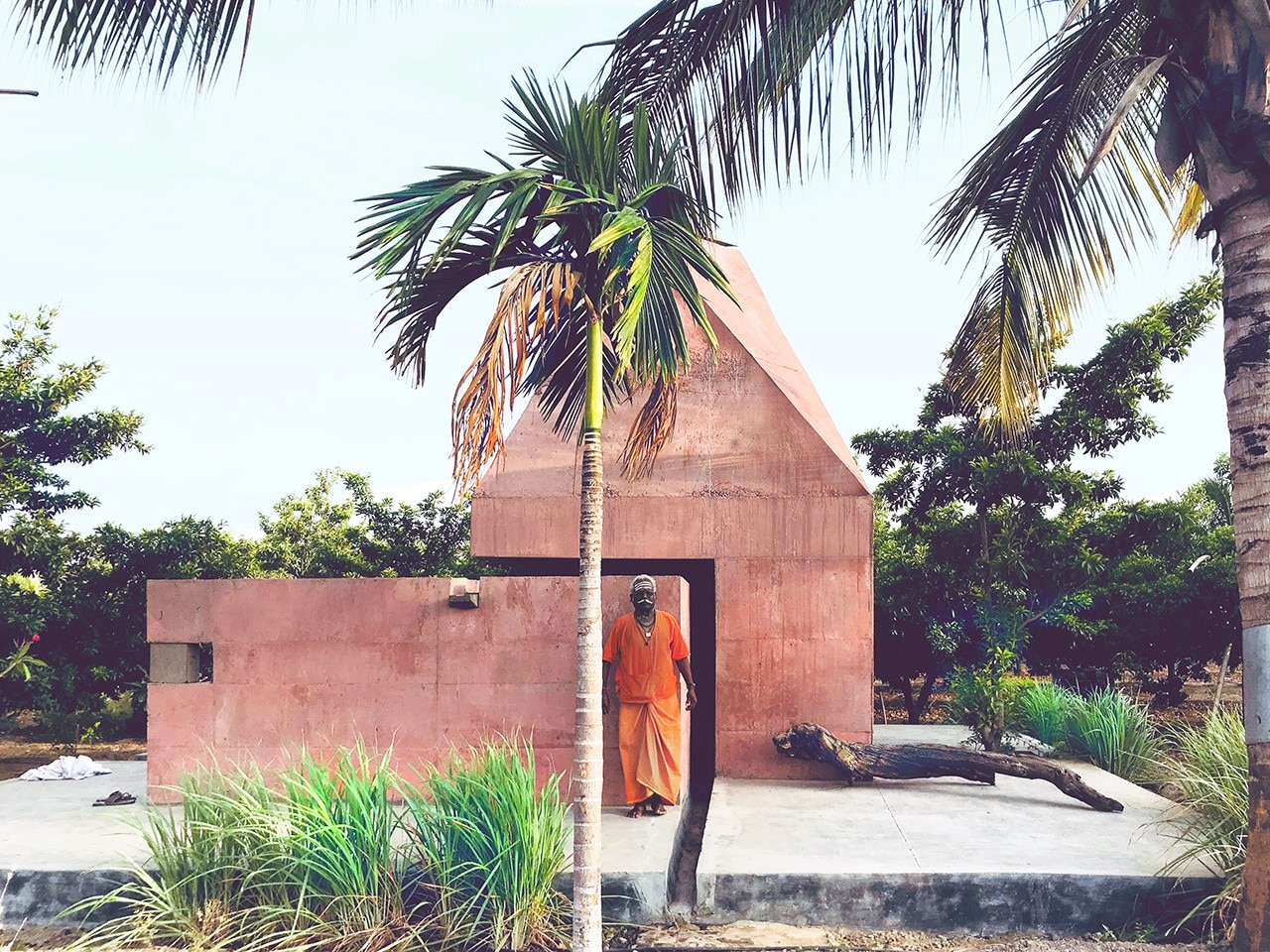 India. A red concrete temple dedicated to Shiva - Domus