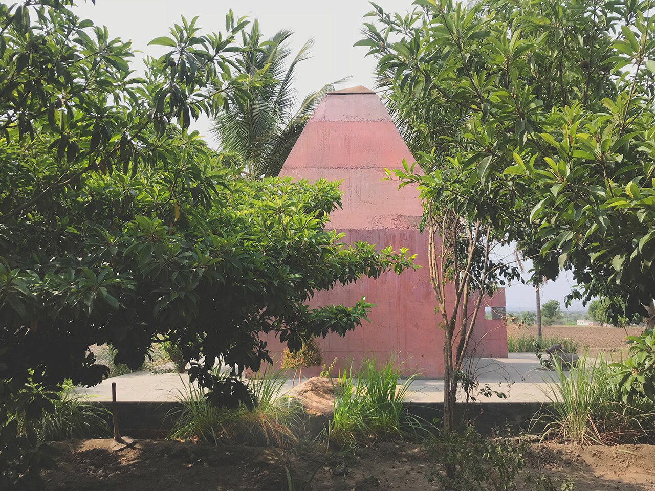 India. A red concrete temple dedicated to Shiva - Domus