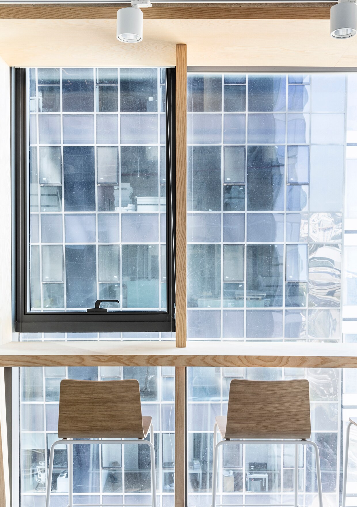 Tinted glass defines zones at wearable tech hub dedicated to pregnancy ...
