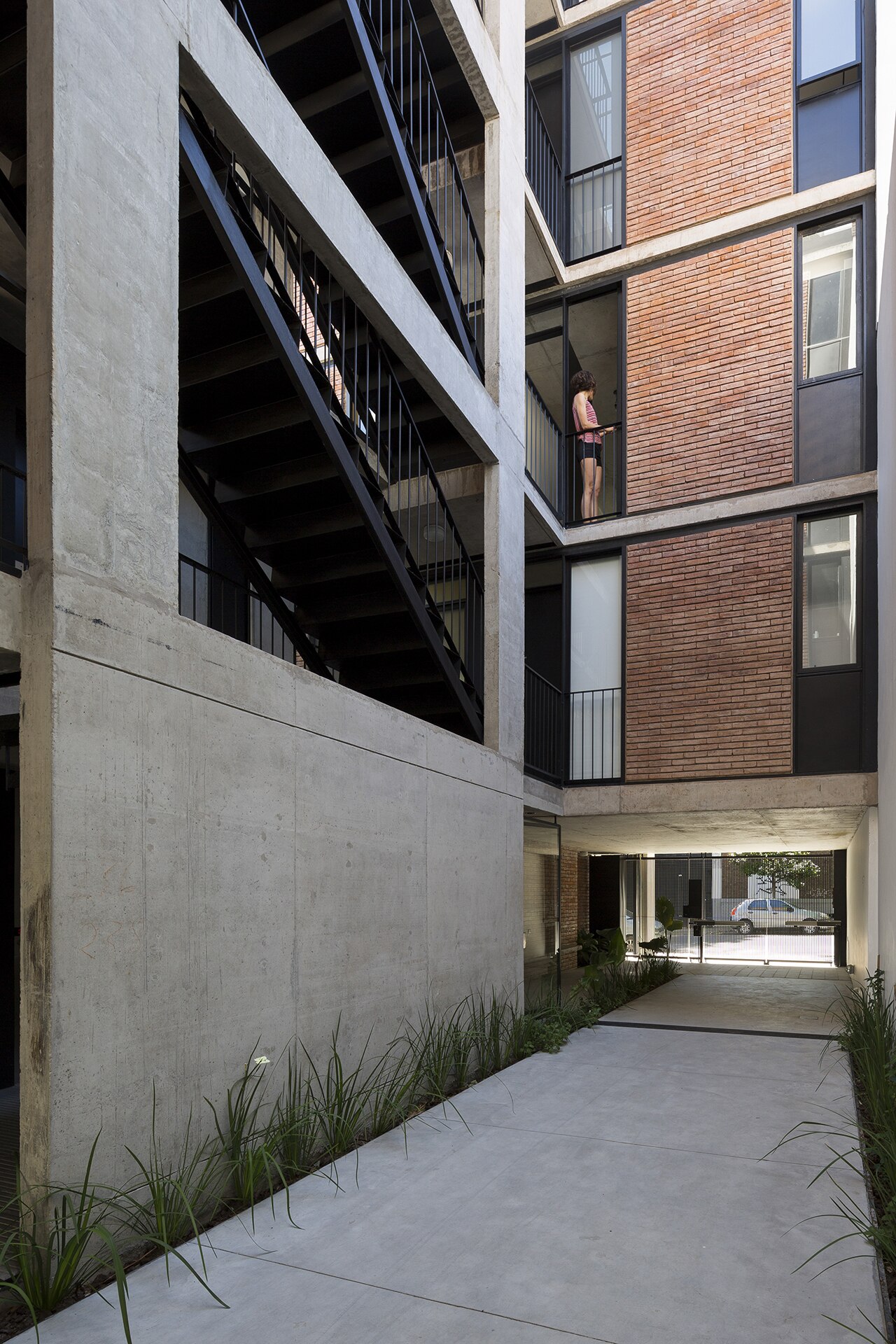 Prefabricated modules form brick facade of Buenos Aires apartment block ...
