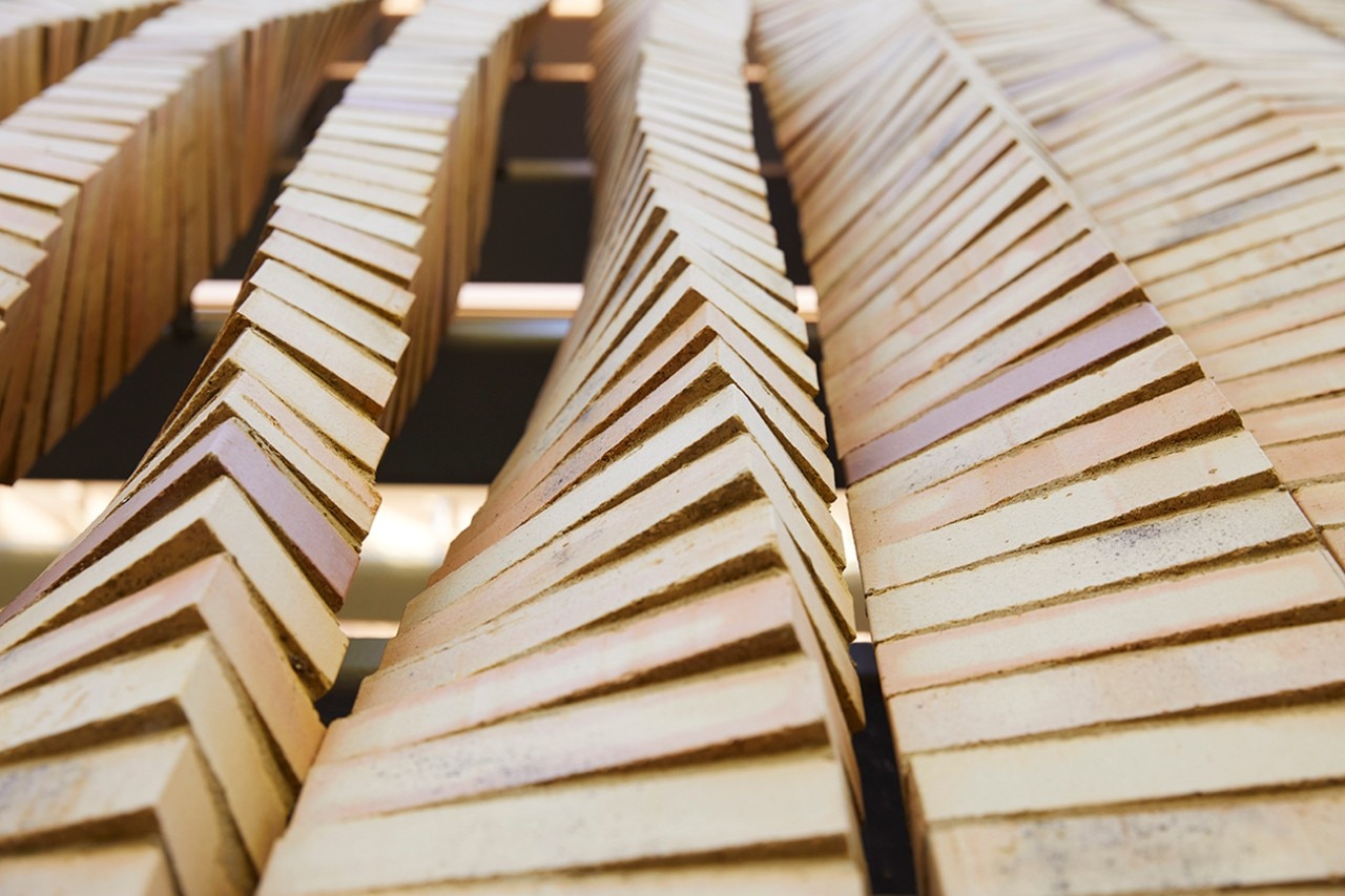 Twisted brick columns protect a courtyard house in Chicago designed by ...