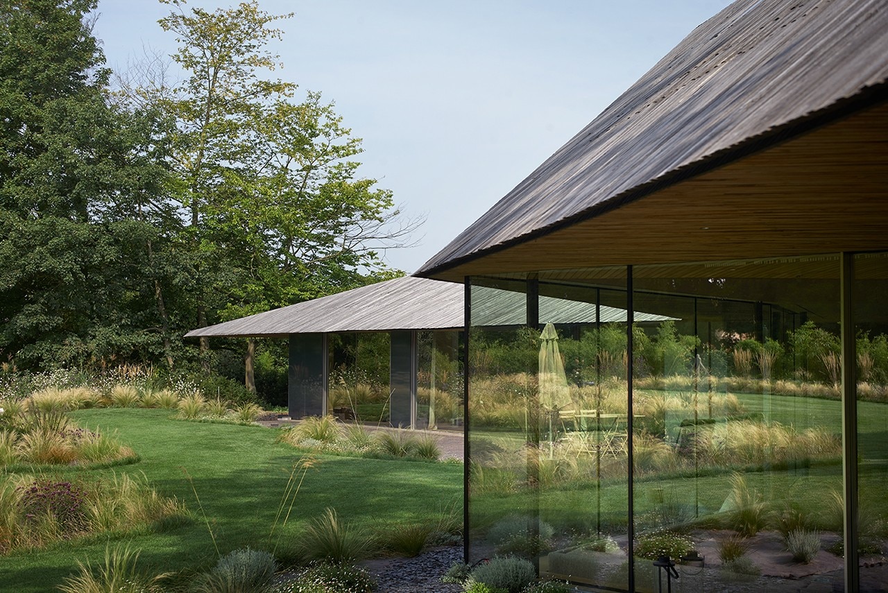 In Lille, the Maison Mouvaux bu TANK is designed as a mysterious wooden ...