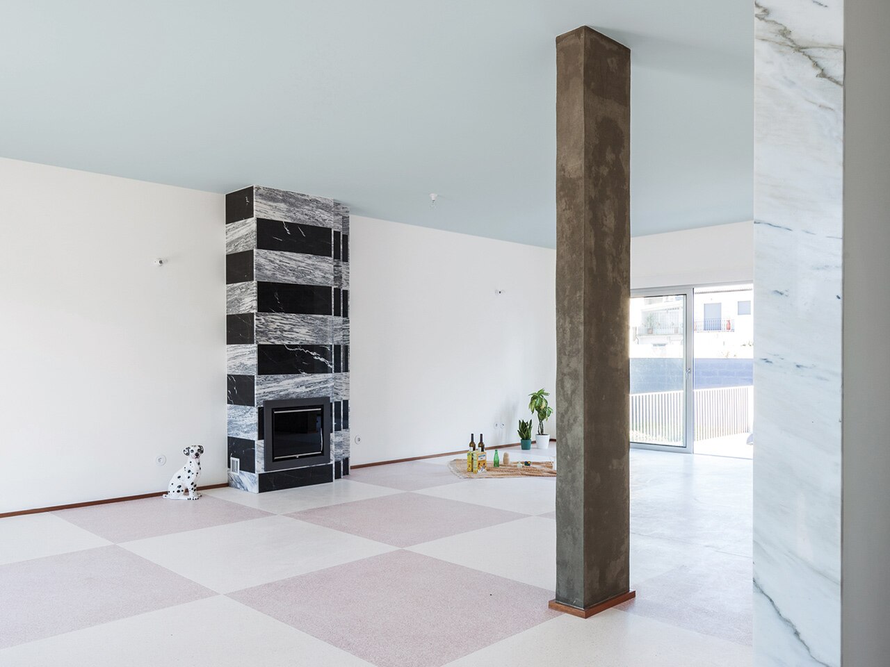 Fala Atelier completes three adjacent houses with garden in Portugal