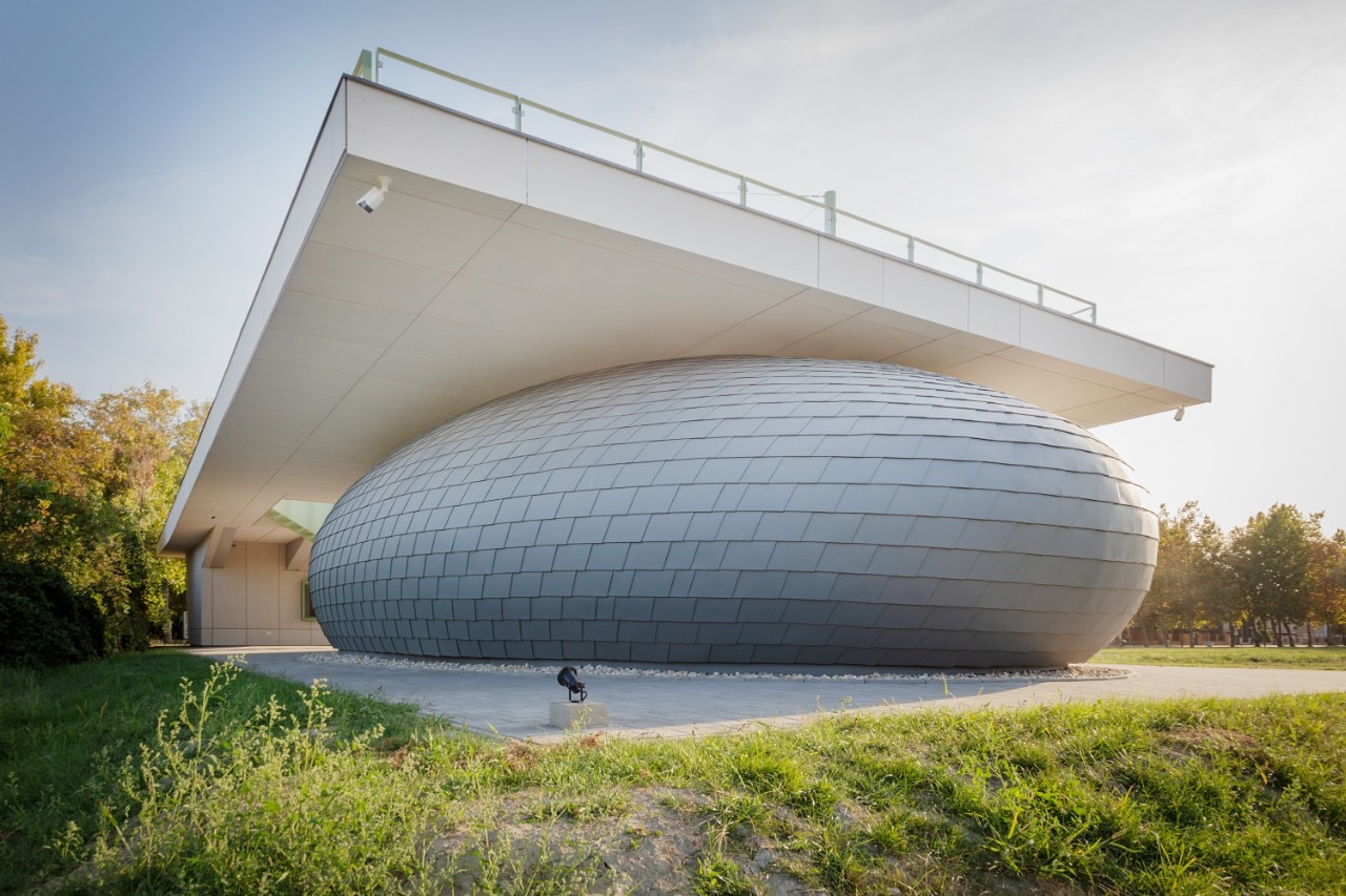 Metal shingles and a roof terrace in The Zam cultural centre - Domus