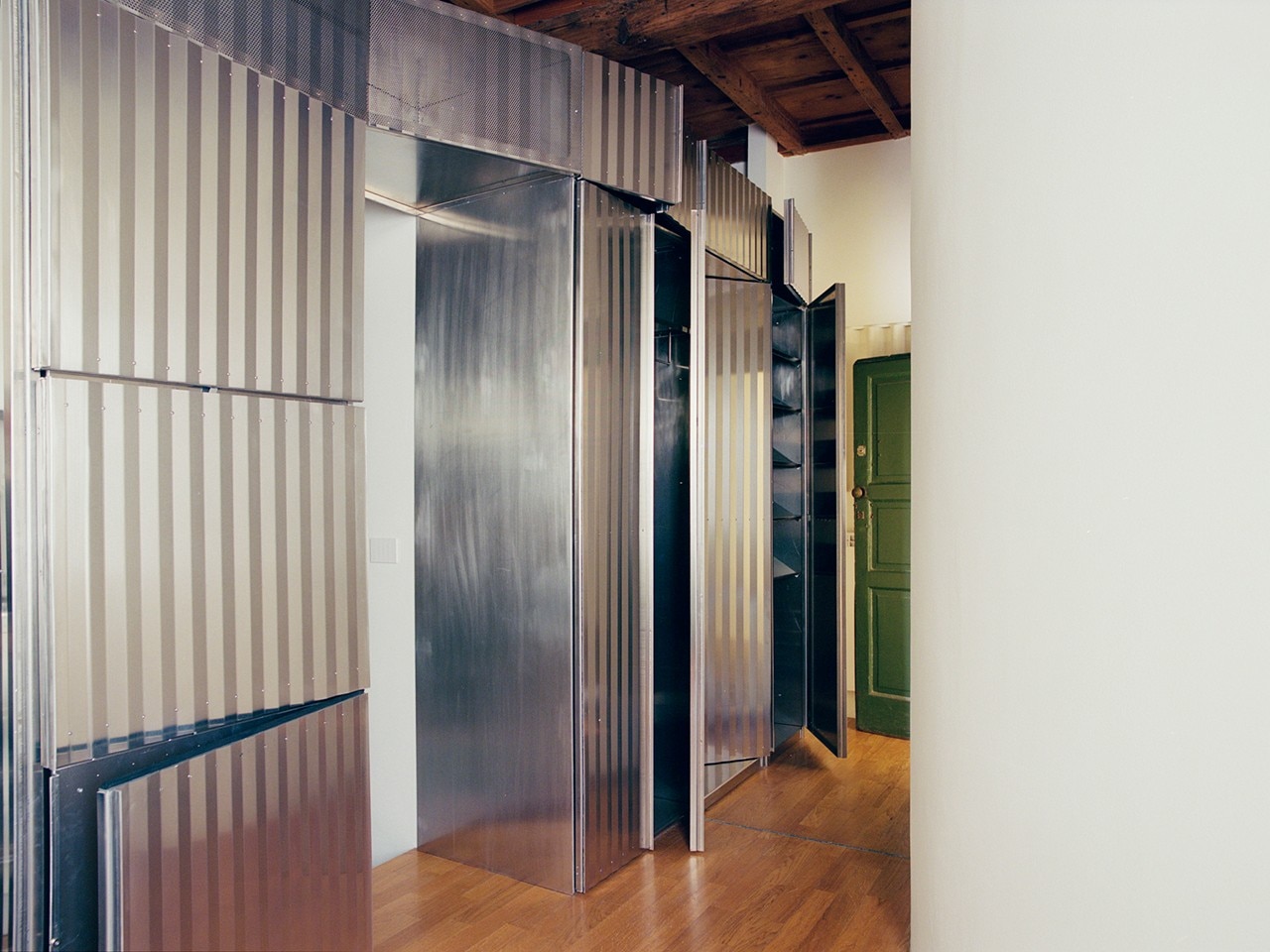A small historic house in Milan, redesigned around an aluminum ...