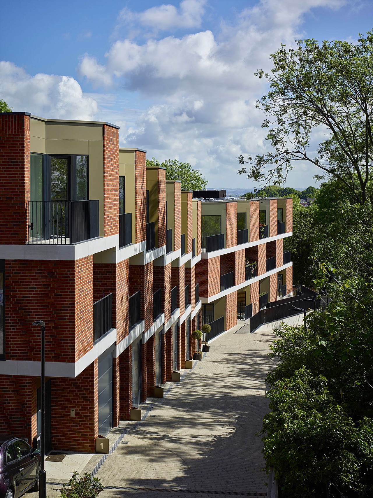 pH+ Architects designed a classic/contemporary brick housing complex in ...