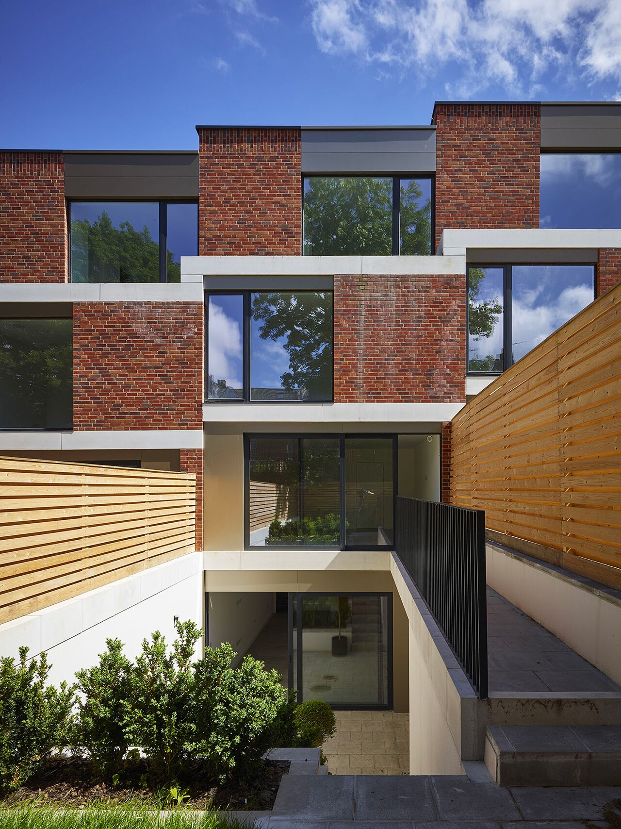 pH+ Architects designed a classic/contemporary brick housing complex in ...